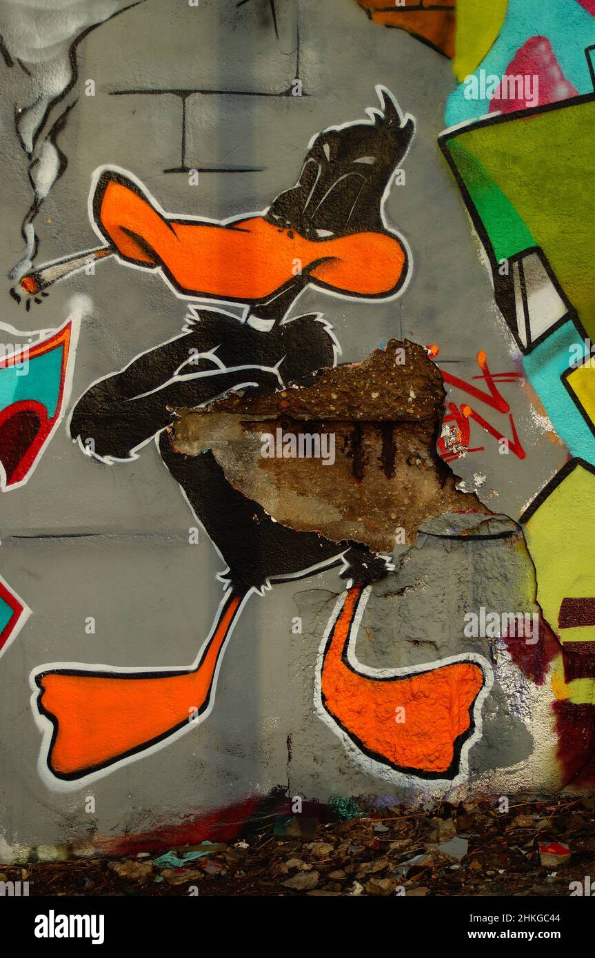 A graffito of Daffy Duck is damaged by corrosion Stock Photo - Alamy