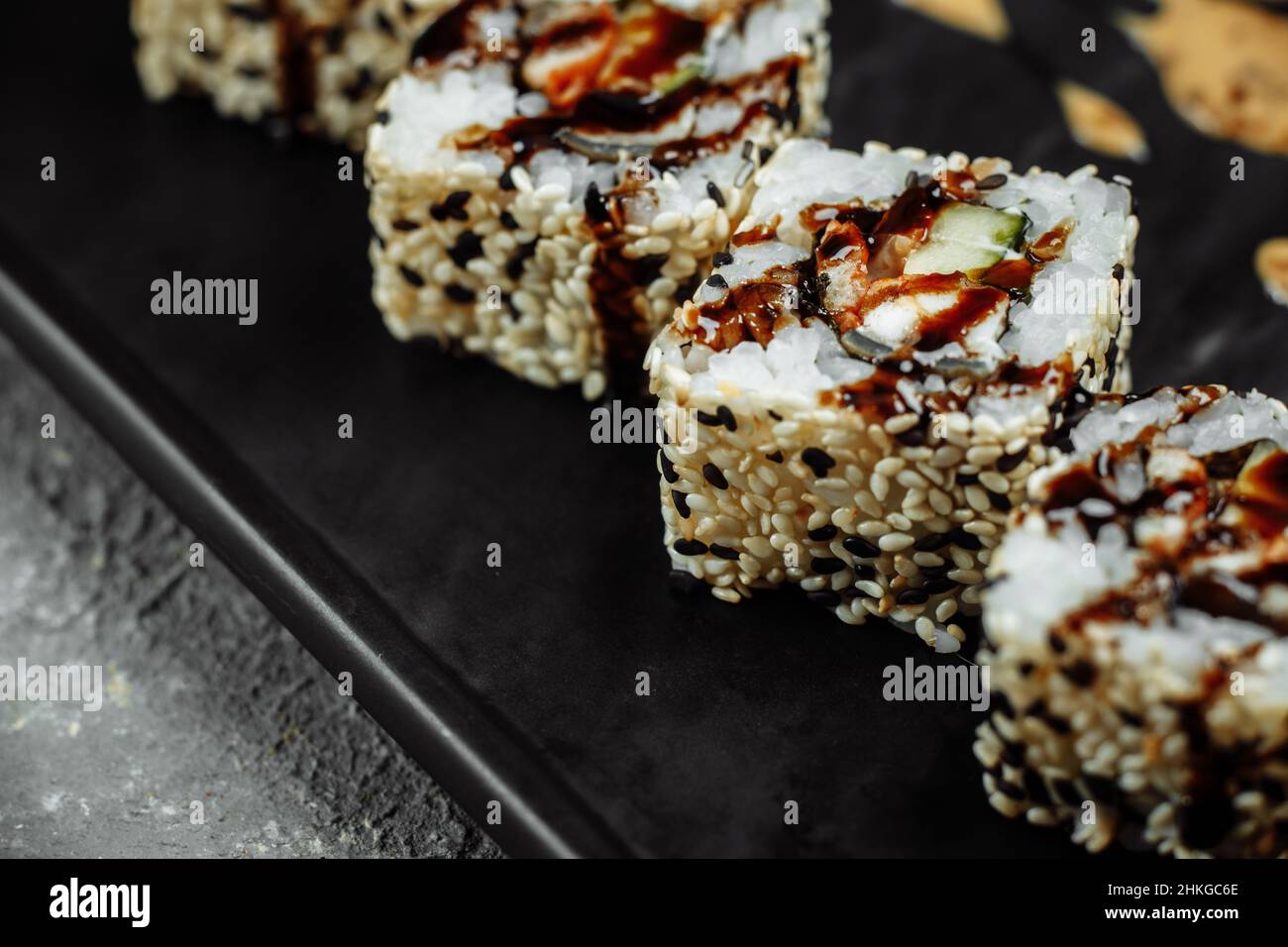 California Roll sushi with smoked eel, cucumber, avocado. Sushi menu ...