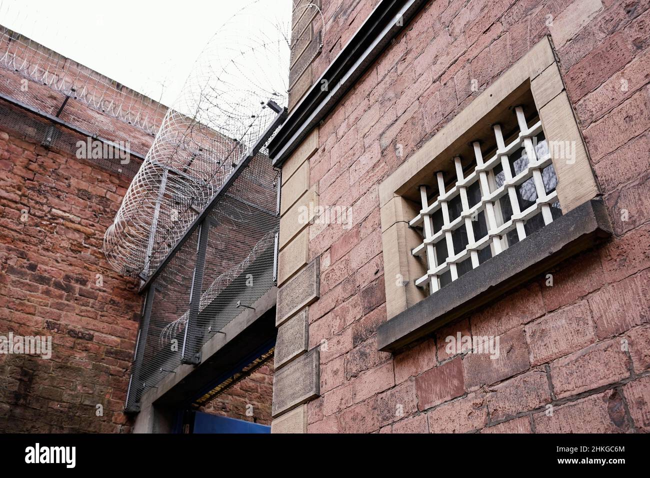 Heidelberg, Germany. 03rd Feb, 2022. Window bars and barbed wire are ...