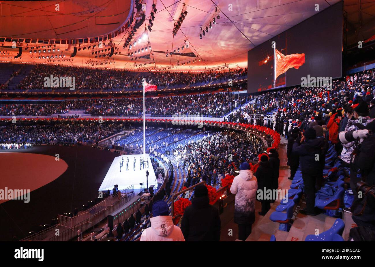 The Chinese flag is hoisted during the opening ceremony of the Beijing ...