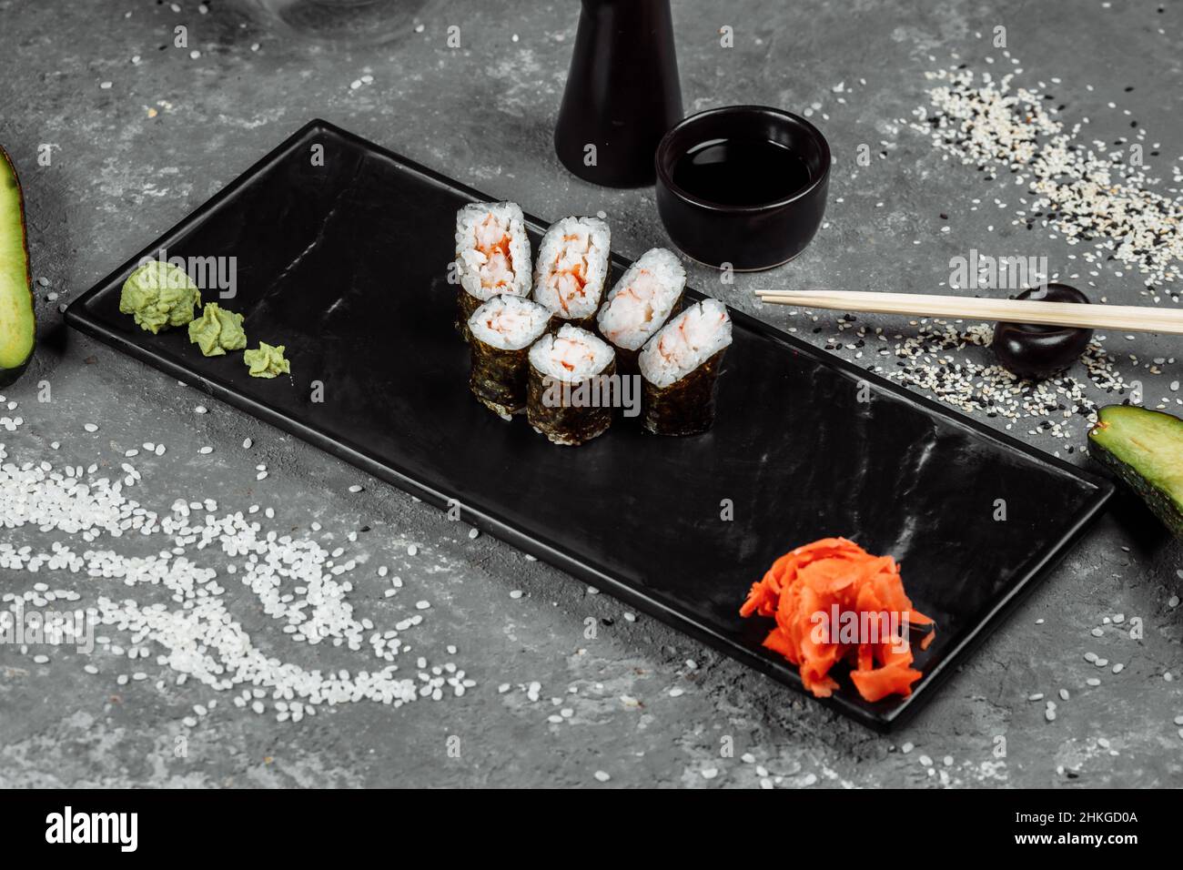 Simple maki with shrimp. Sushi on a gray background Stock Photo - Alamy