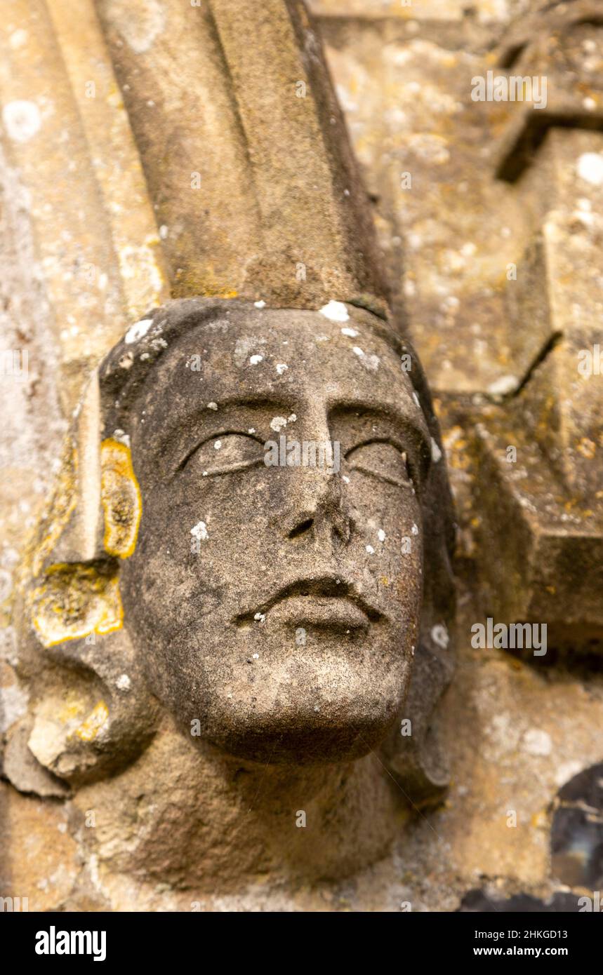 Carved stone face in porch of Oakley church, Suffolk, England, UK Stock ...