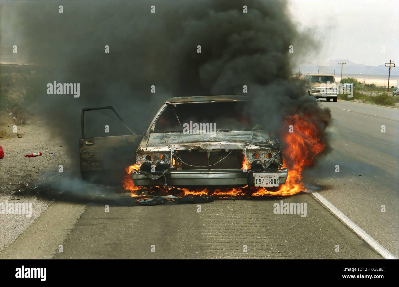 Death Valley, USA - June 9. 1998: Front view on burned-out car wreck ...
