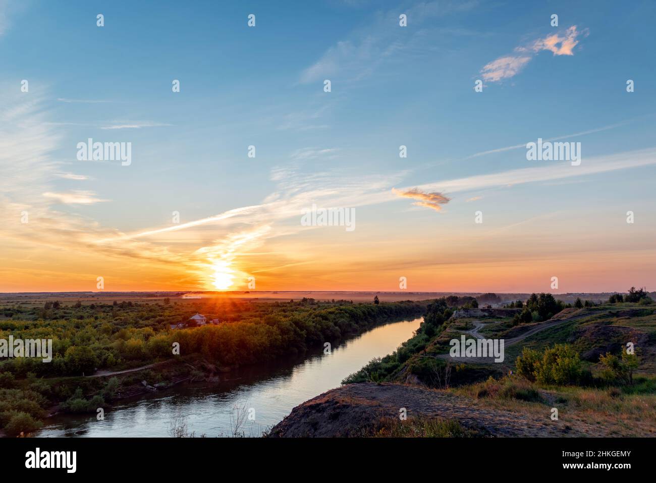 The heavenly light of the sun over the river and the forest.Dramatic ...