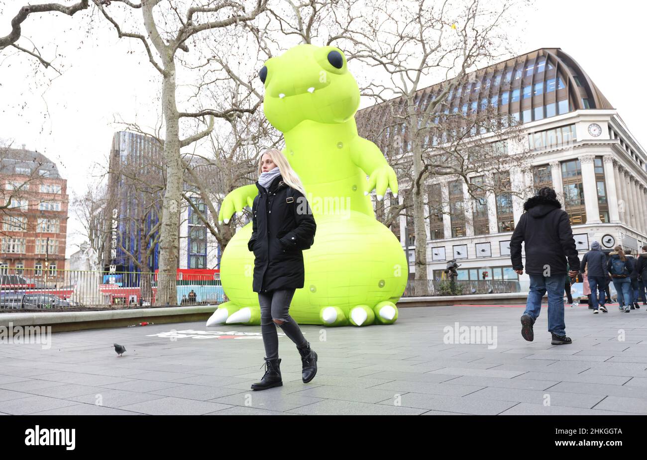 NOTE CONTENT IN PHOTO A giant phallic looking lizard is inflated in ...