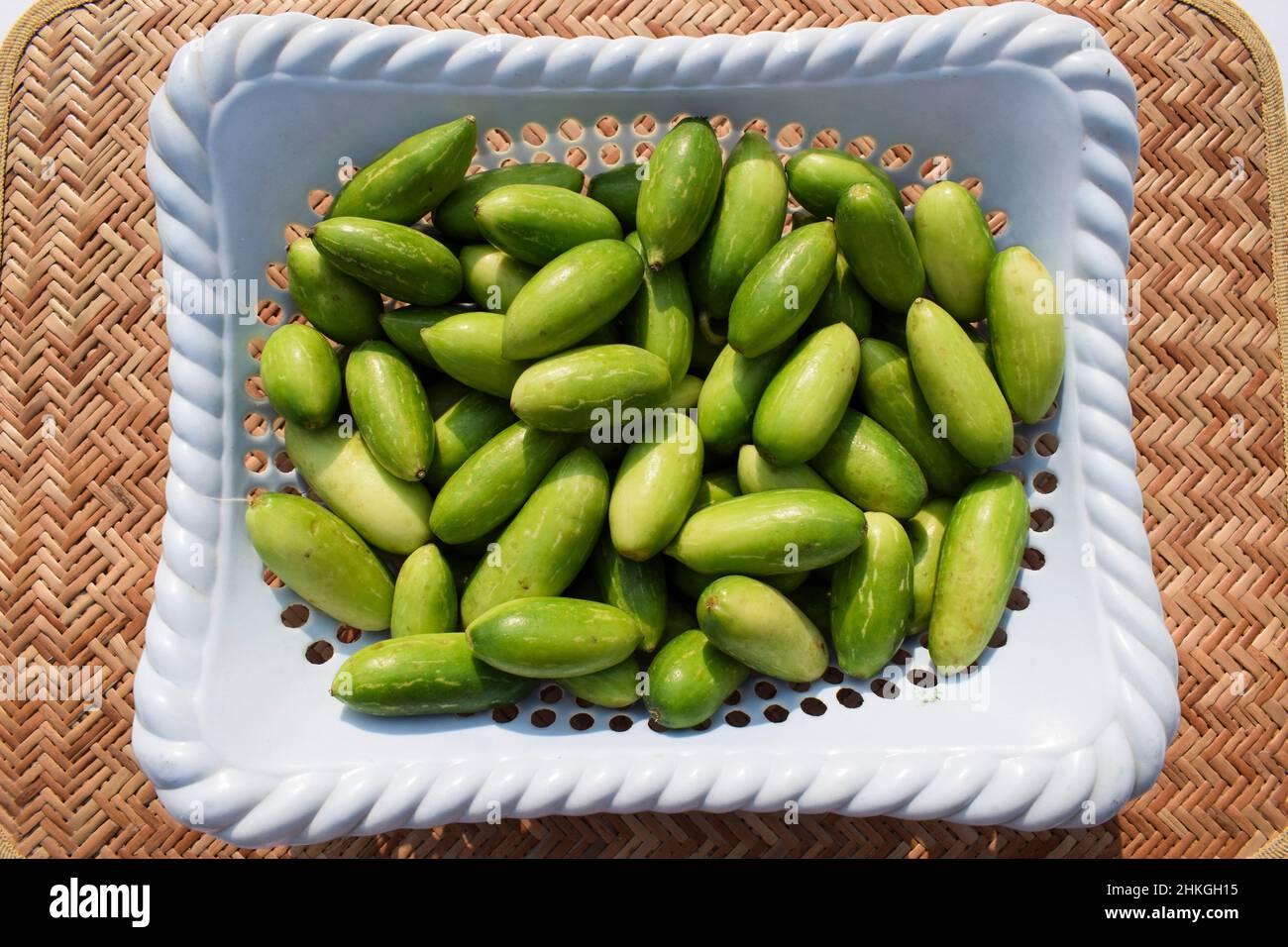 Ivy gourd or scarlet gourds known as Tindora or Ghola, green vegetables ...