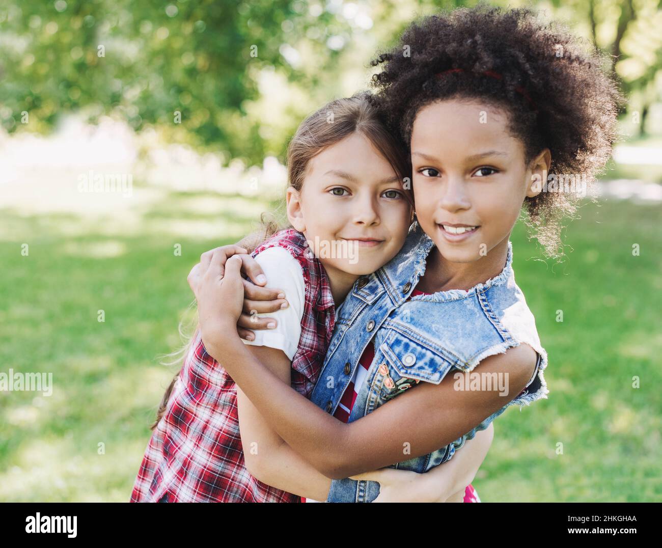 Female kids children hug hi-res stock photography and images - Alamy