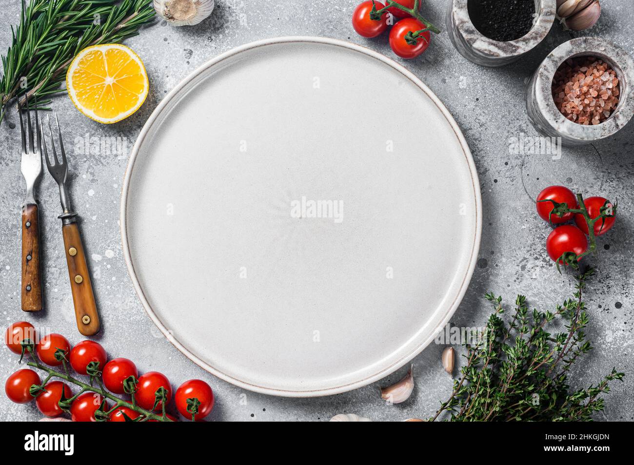 Food cooking and healthy eating background with empty rustic plate and ...