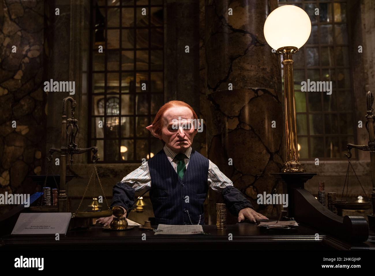 Goblin bank teller hi-res stock photography and images - Alamy