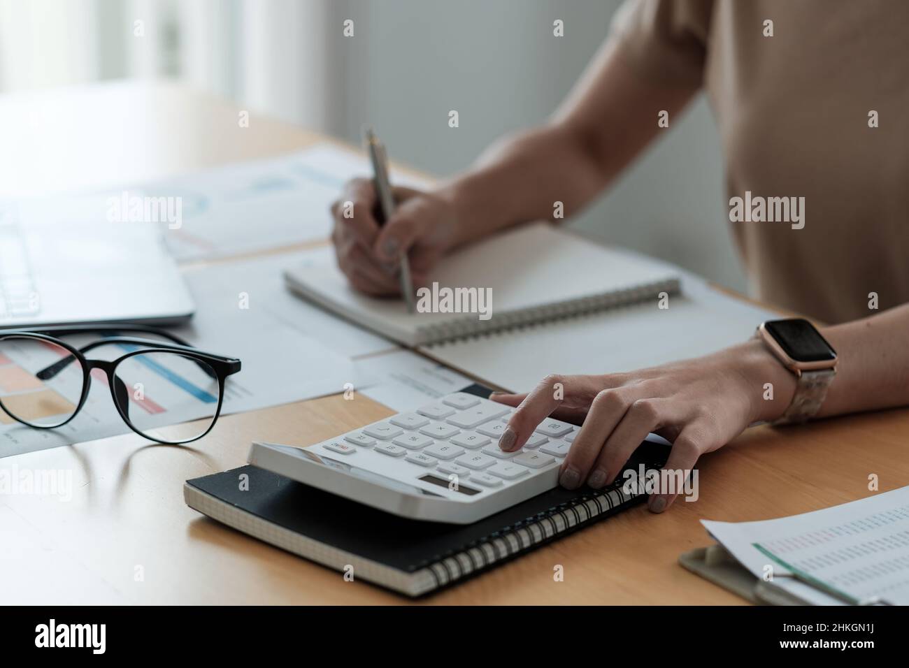 Business woman calculating companys hi-res stock photography and images ...