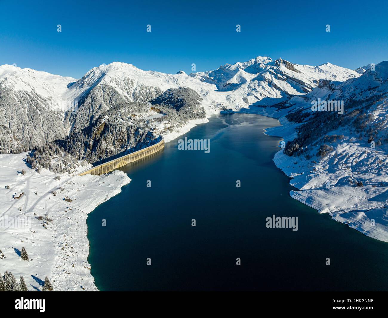 Dam of a river flowing through European Alps mountain range Stock Photo ...