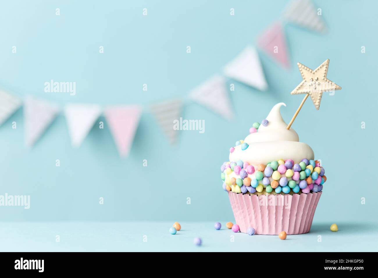 Pastel celebration cupcake for a birthday party Stock Photo - Alamy