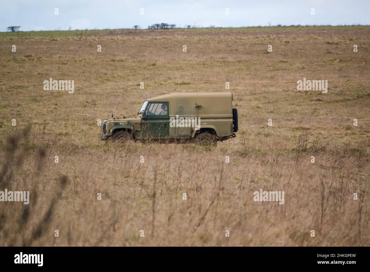 land rover defender wolf army medium utility vehicle on a military ...