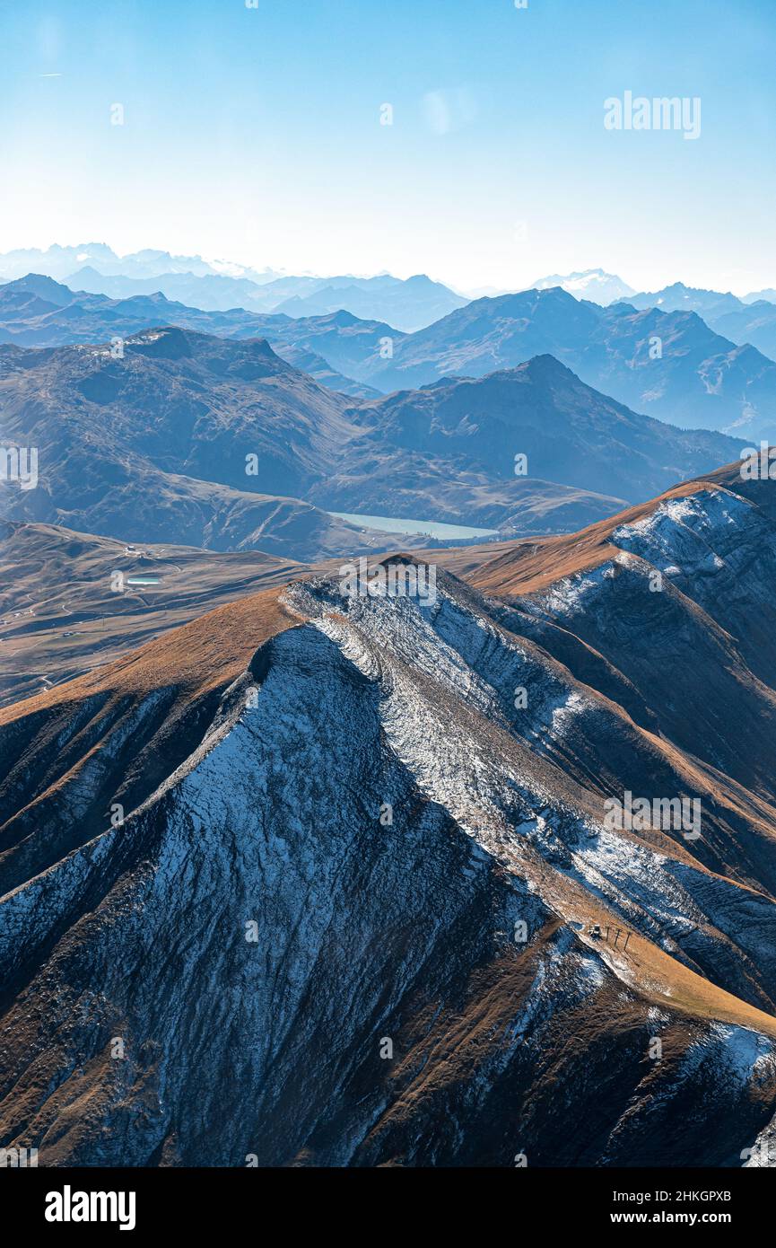 A perfect portrait shot into the depths of alps mountain ranges of ...