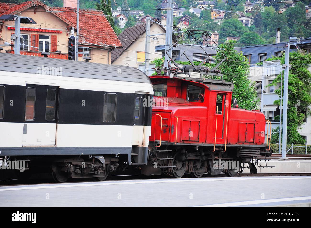 Passenger train arrives to the platform. Chur. Switzerland Stock Photo ...