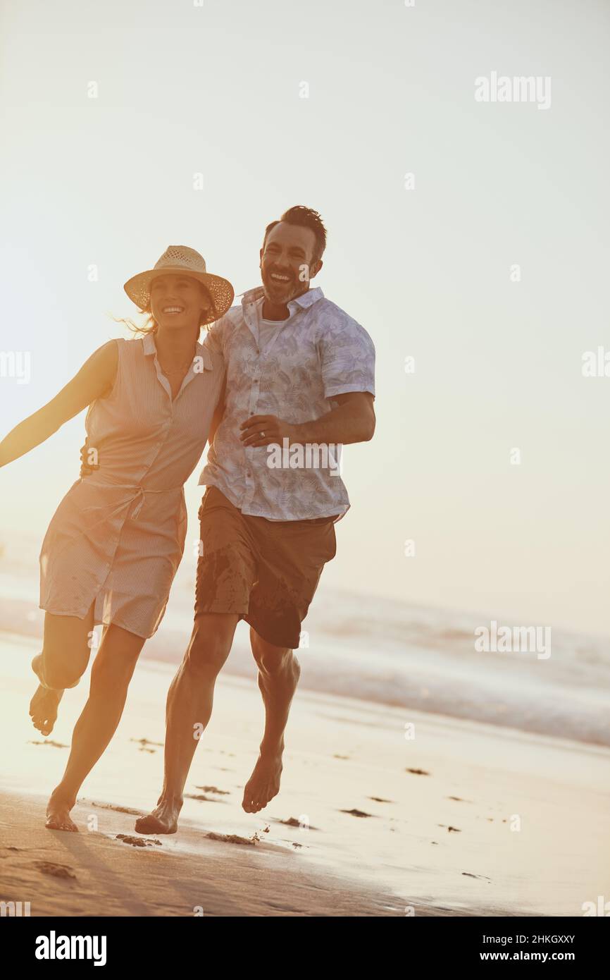 Life is so much more fun at the beach Stock Photo - Alamy