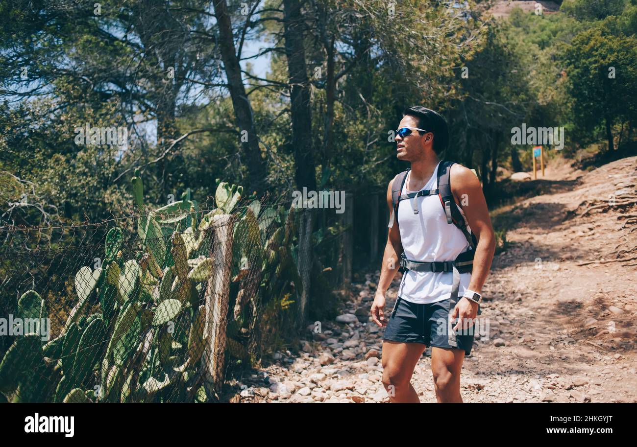 Man backpack walk away hi-res stock photography and images - Alamy