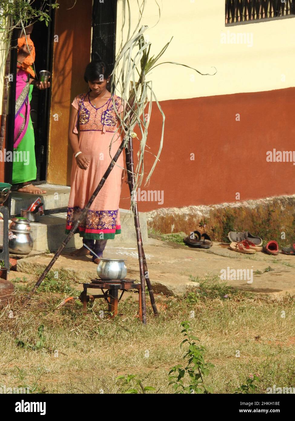 Closeup of Indian cute family celebrating Makara Sankranti Festival and ...