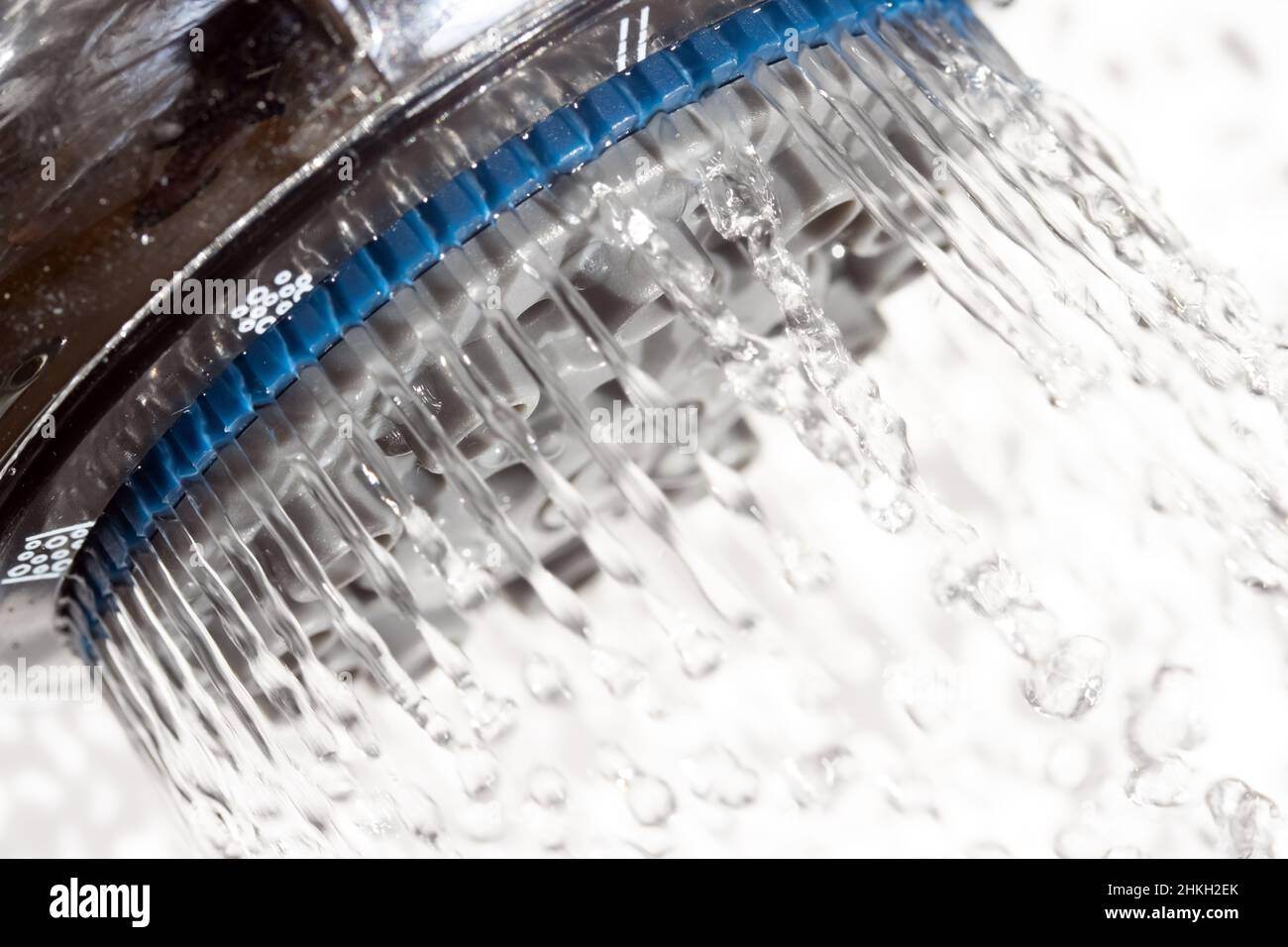 The water drops running from the shower head, close up view Stock Photo ...
