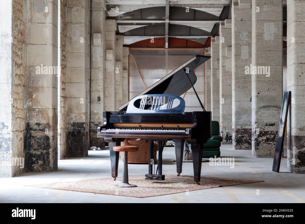 Grand piano in rustic environment Stock Photo - Alamy