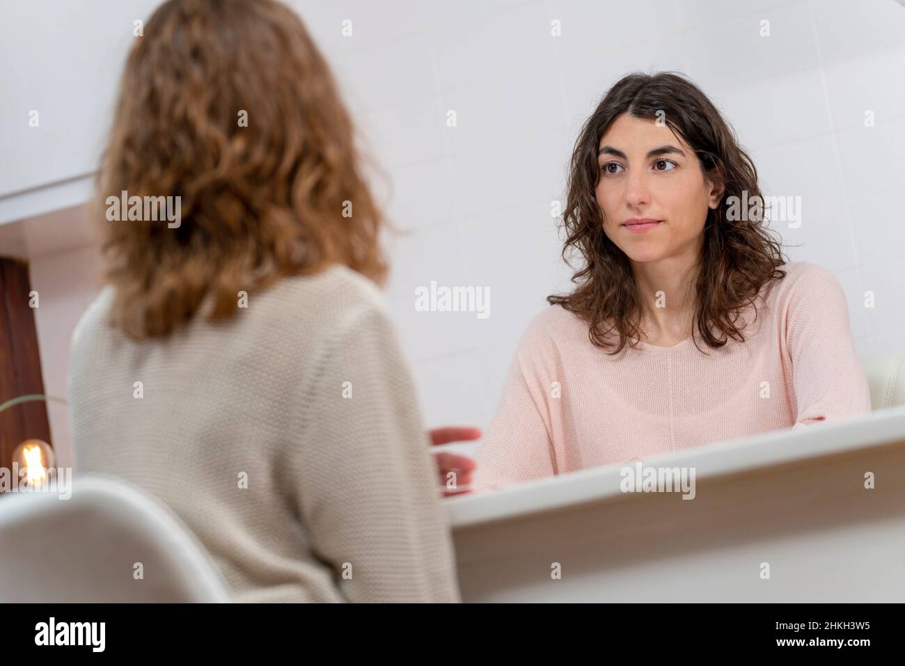 Two women serious conversation hi-res stock photography and images - Alamy