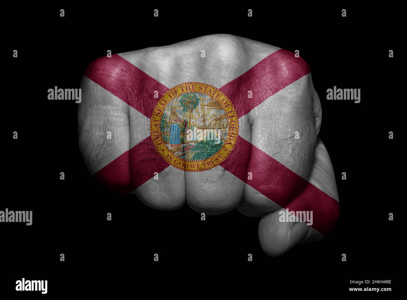 US country Florida Flag painted on strong fist on black background ...