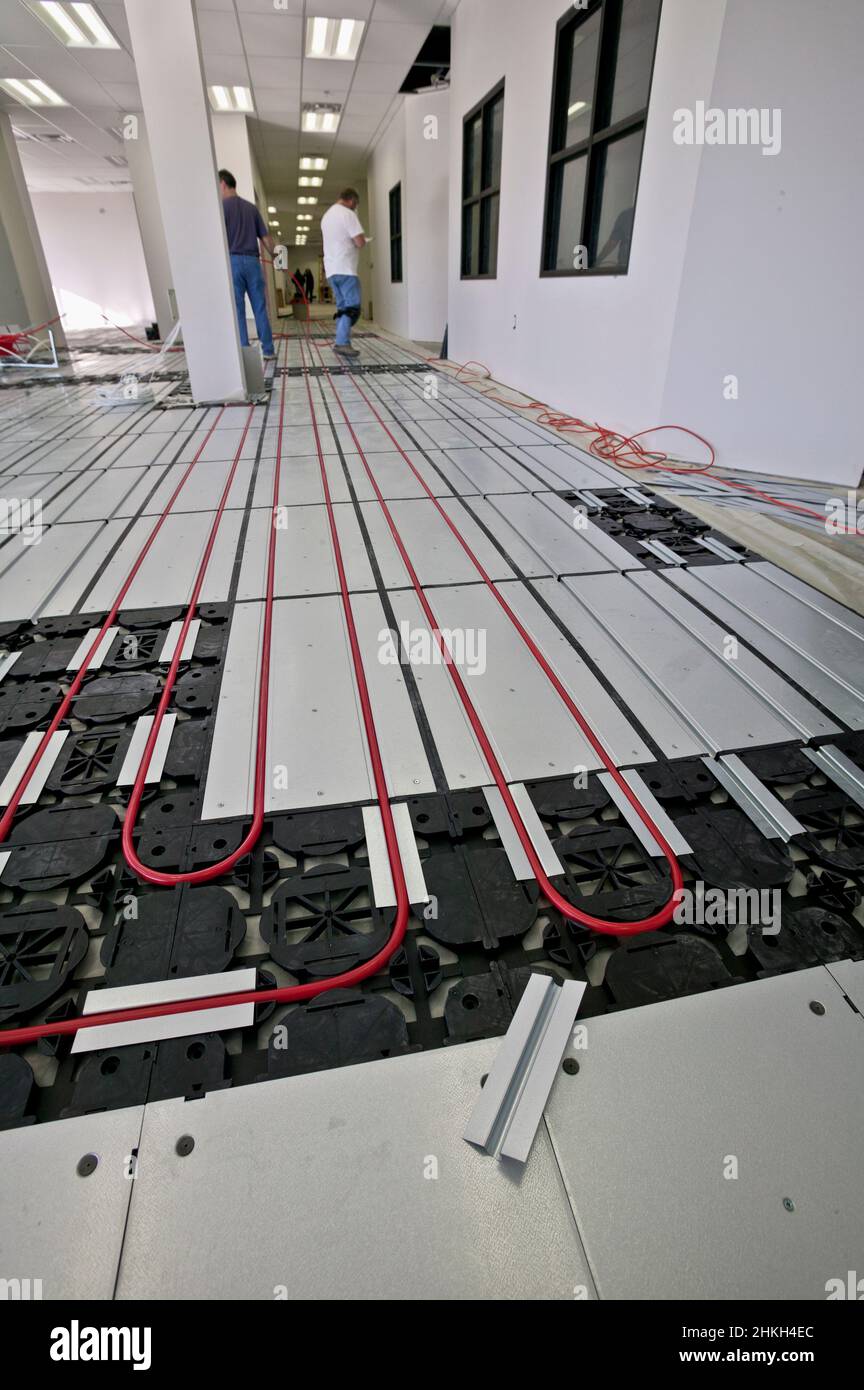Commercial hydronics sub-floor installation Stock Photo - Alamy
