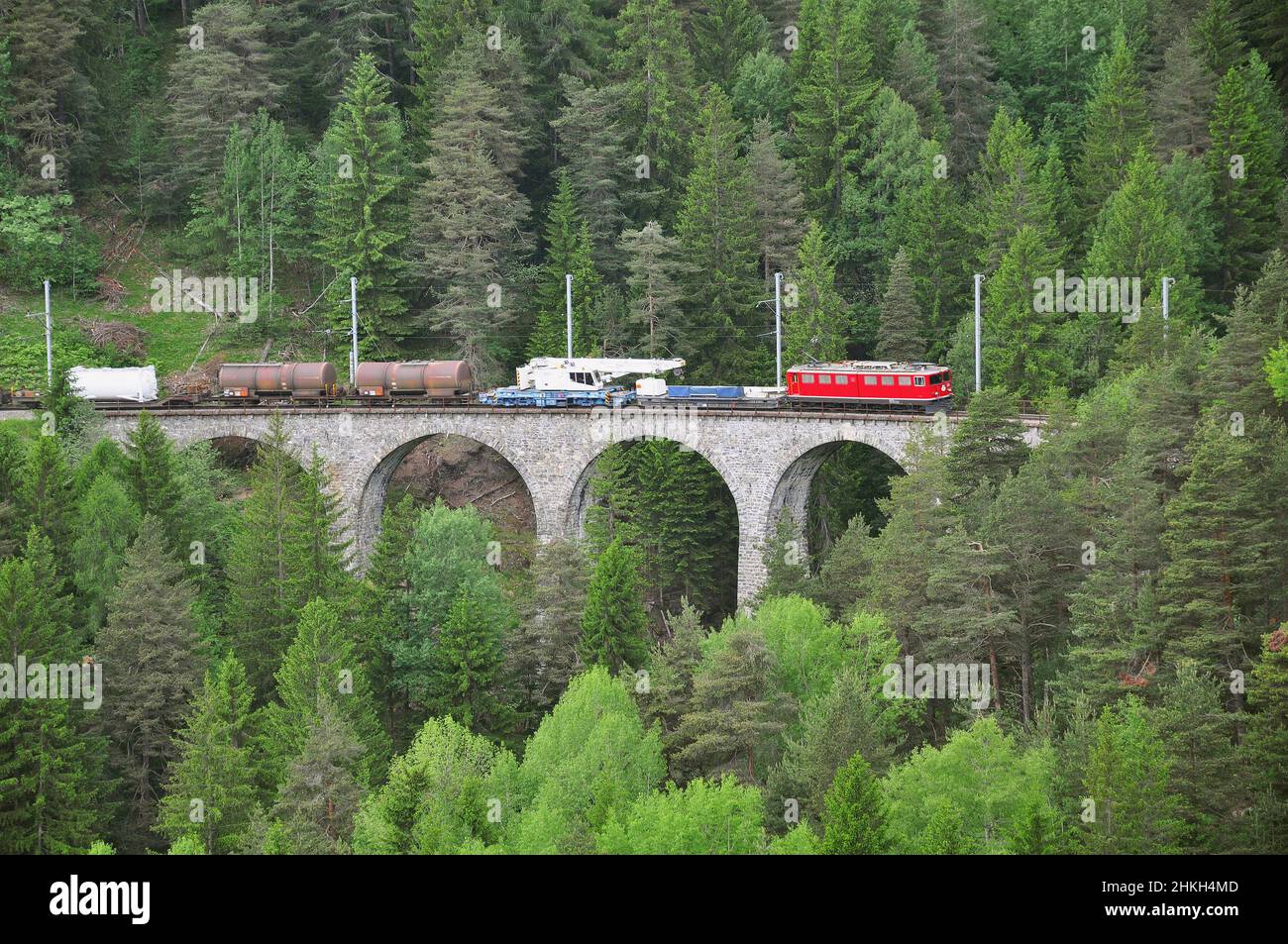 Freight train goes from Chur to St. Moritz. Swiss Alps Stock Photo - Alamy