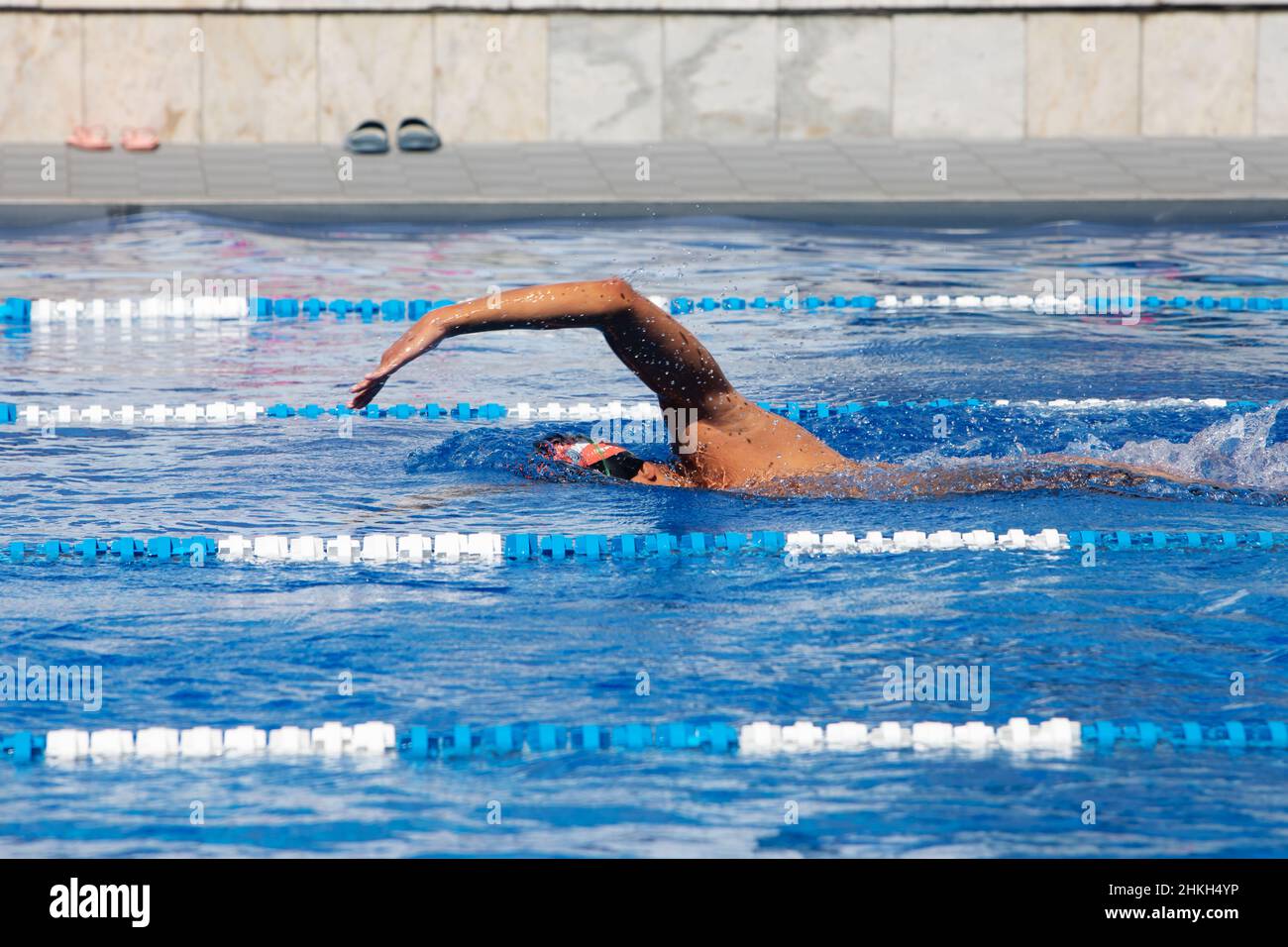 Professional male swimmer swimming in the pool Stock Photo - Alamy
