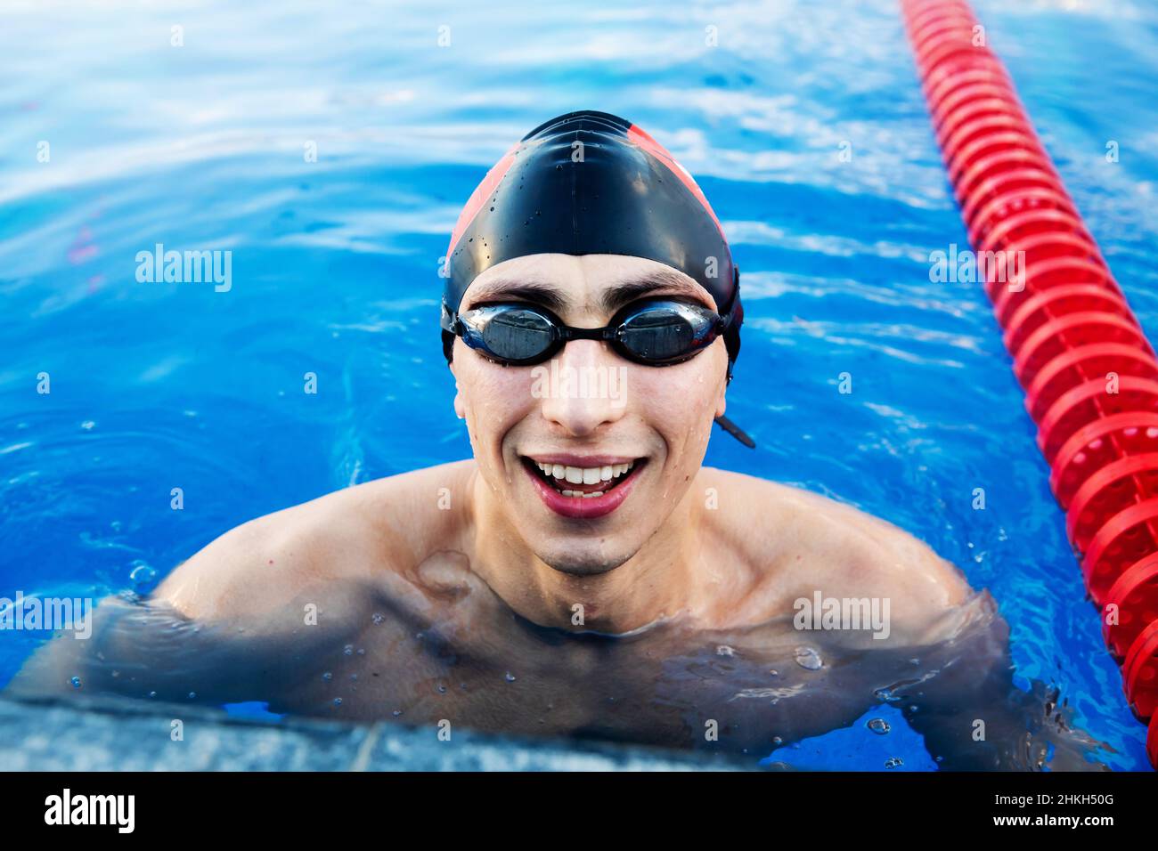 Professional male swimmer swimming in the pool Stock Photo - Alamy