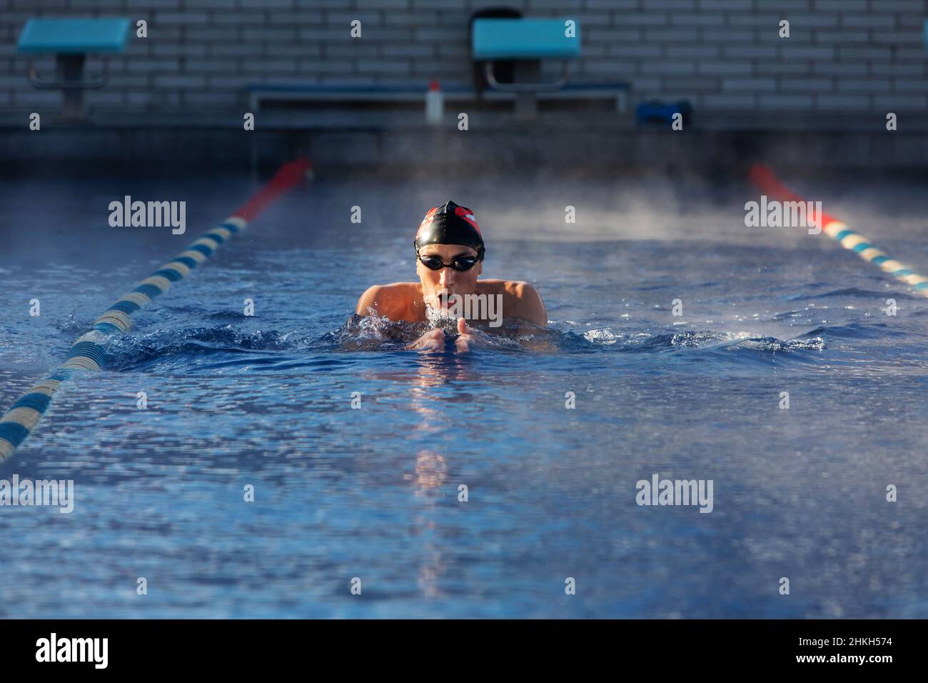 Professional male swimmer swimming in the pool Stock Photo - Alamy