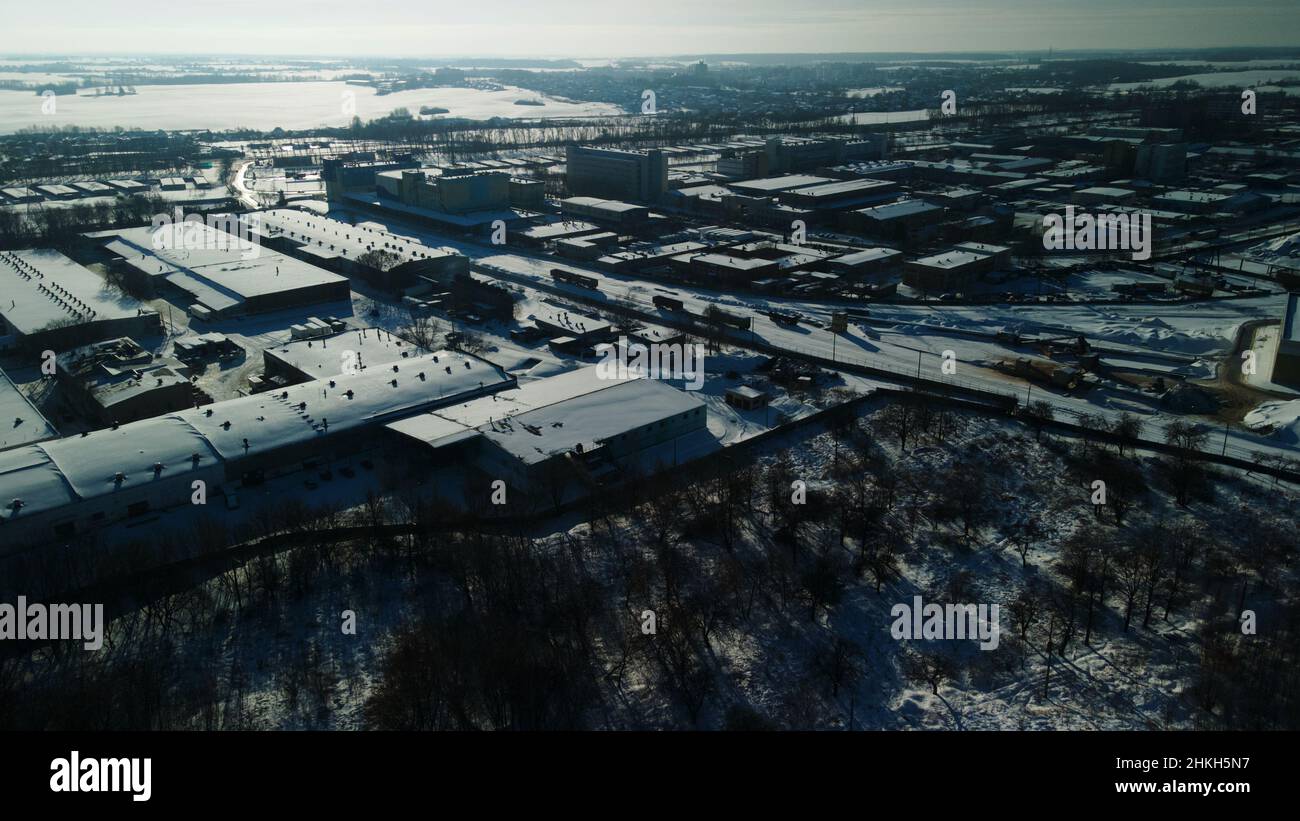 Industrial area on the outskirts of the city. Factory buildings are ...