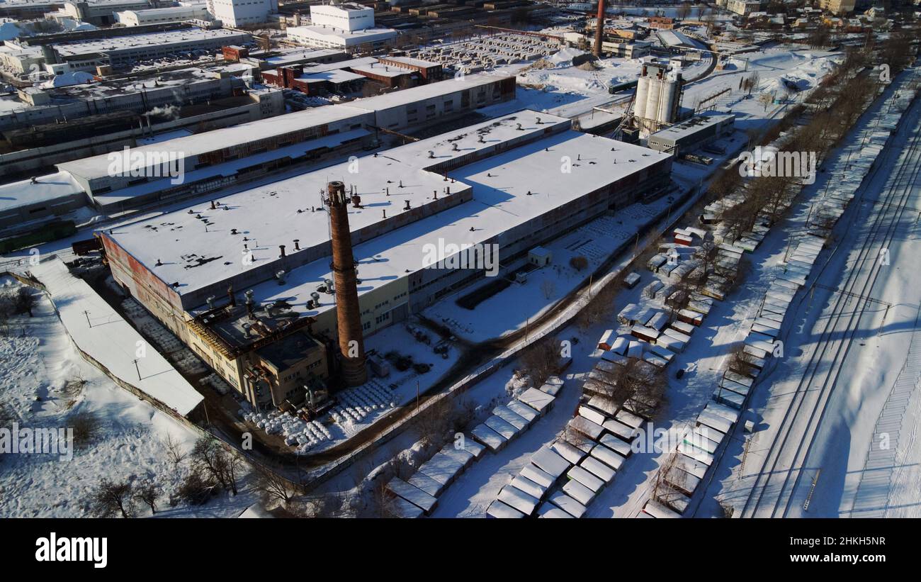 Industrial area on the outskirts of the city. Factory buildings are ...
