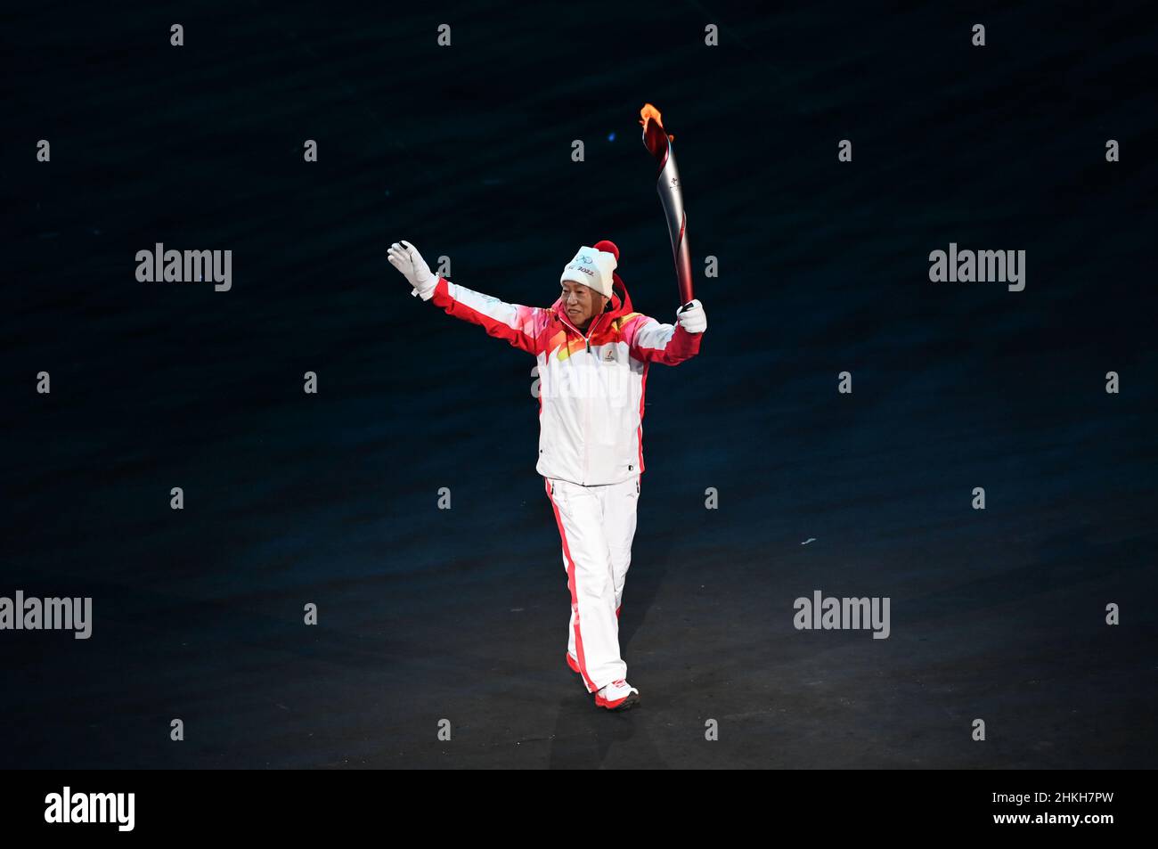 Beijing, China. 4th Feb, 2022. Torch bearer Zhao Weichang gestures during the opening ceremony ...
