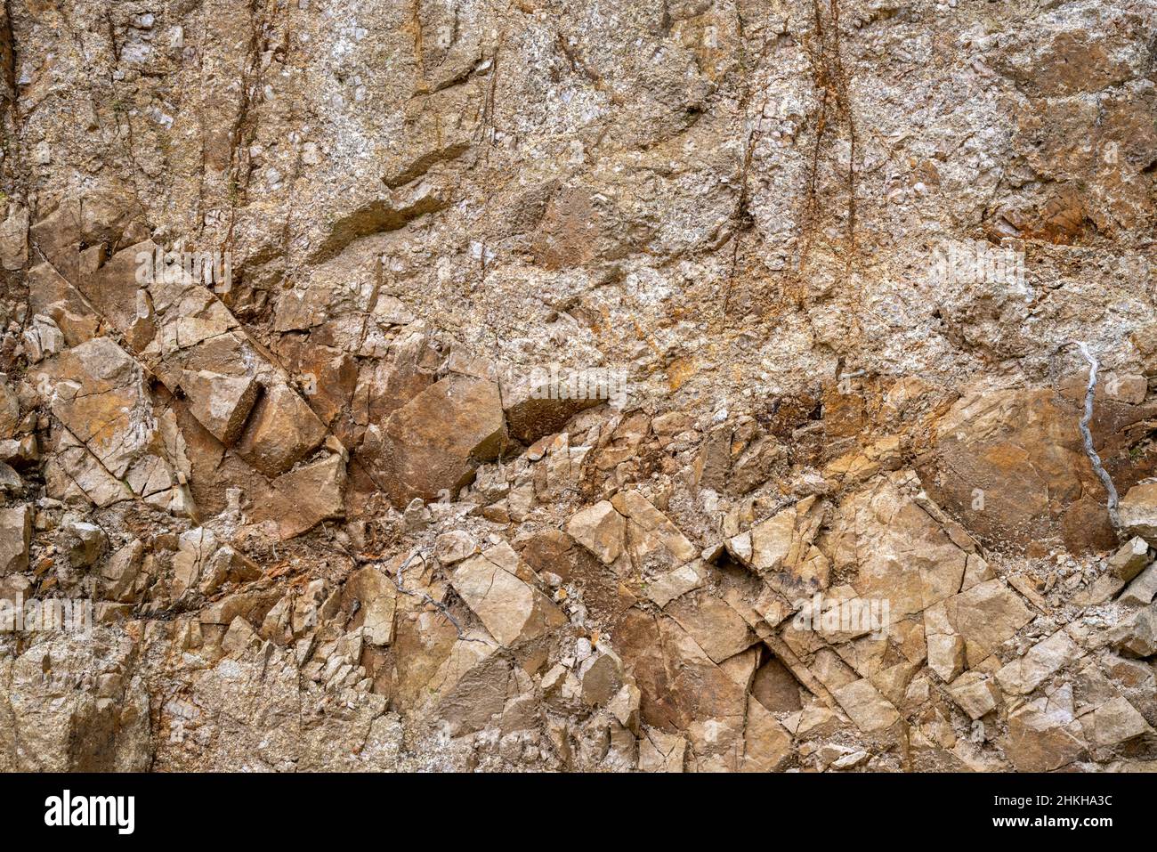 Weathered granite rock in sunlight as texture or background Stock Photo ...