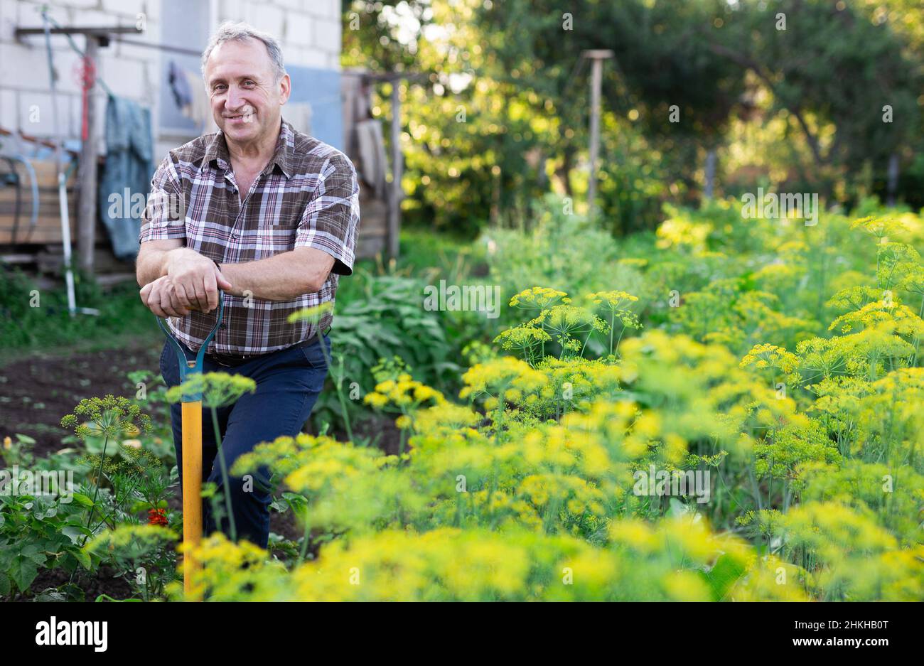 Mature farmer posing in hi-res stock photography and images - Alamy