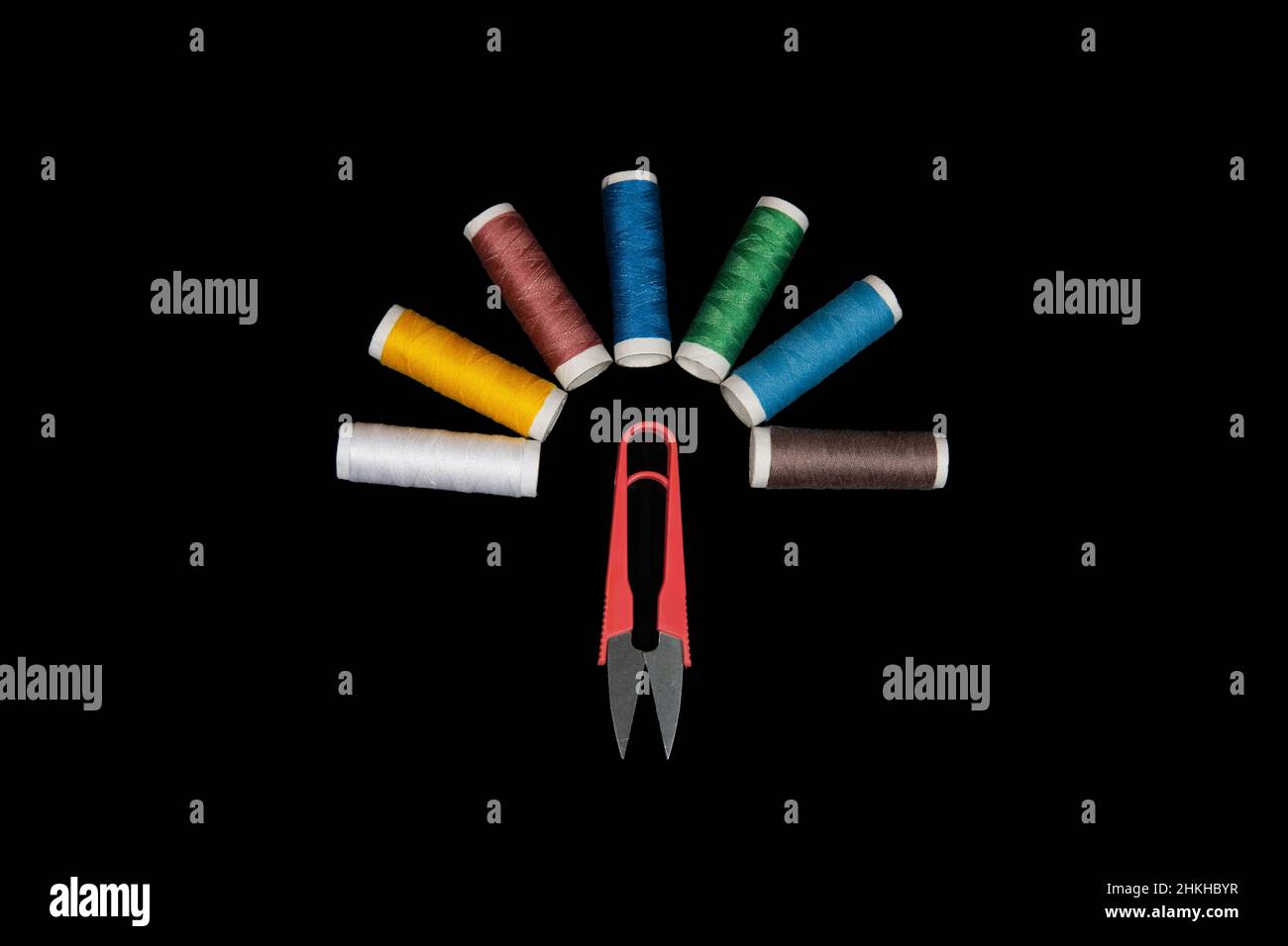 colorful sewing threads on black background for designers Stock Photo ...