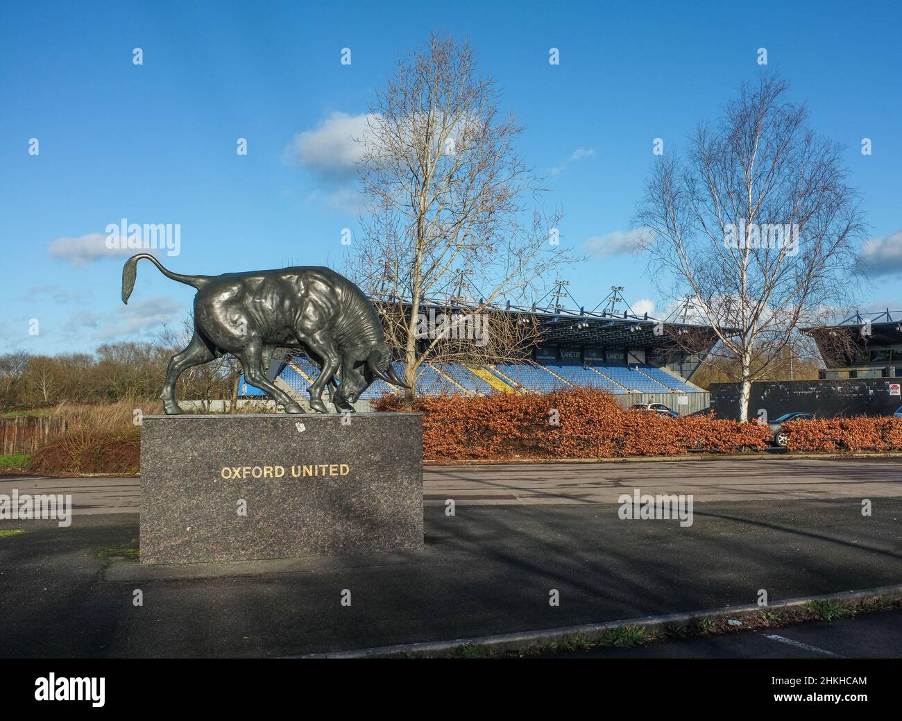 The bronze ox sculpture standing outside Kassam Stadium reflects the ...
