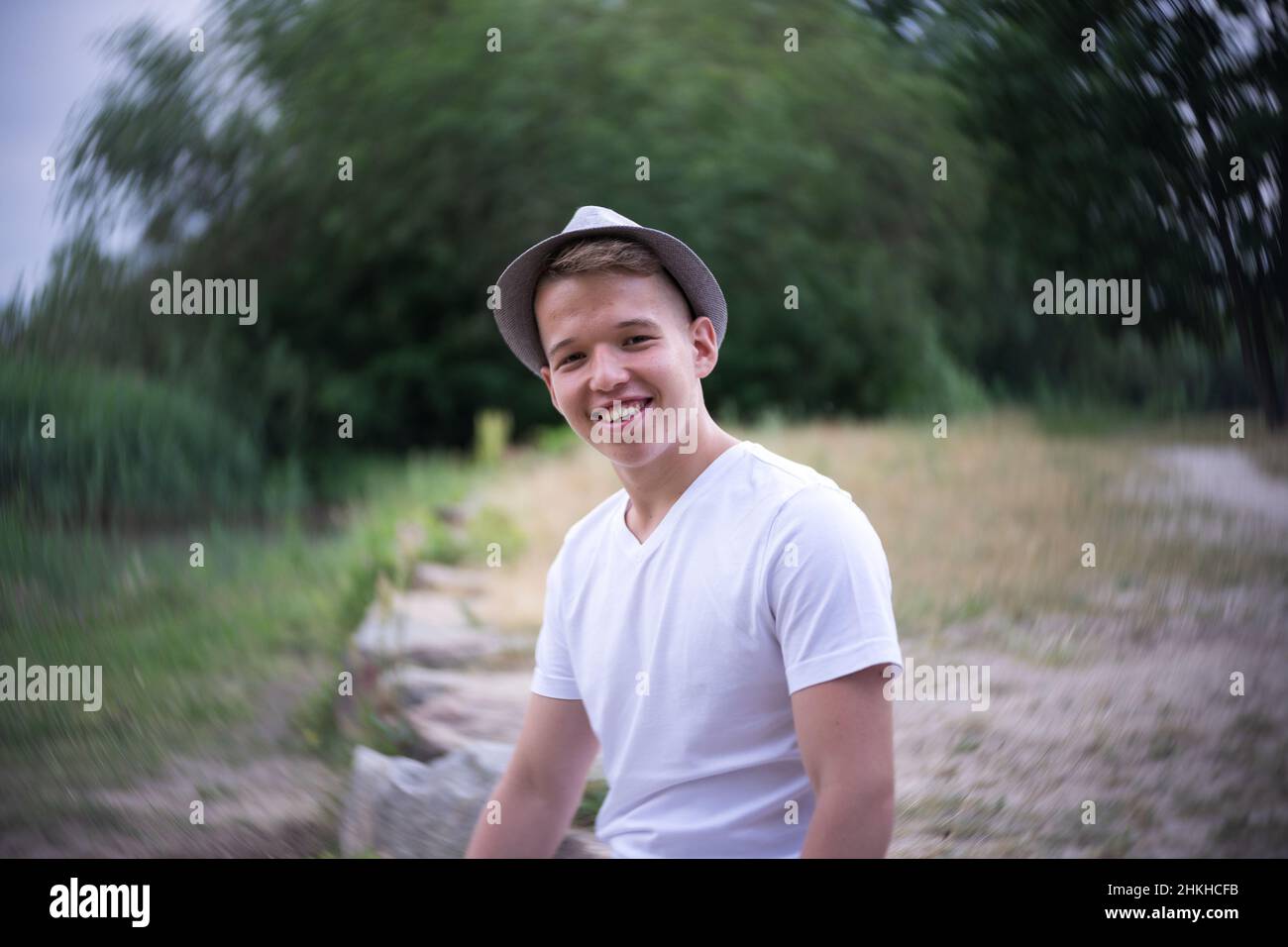 Portrait of a teenager on the background of nature. Natural skin of the ...