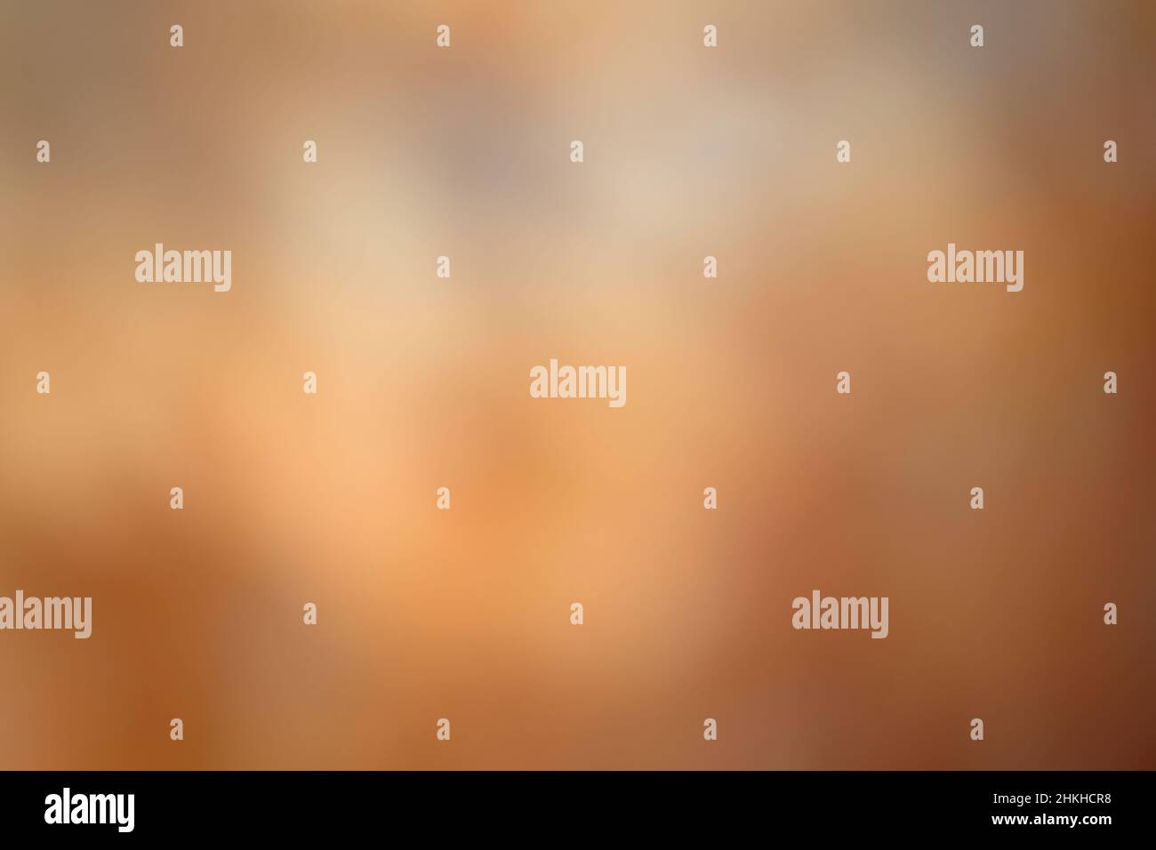 Brown blurred background. Brown defocused background with orange tints ...