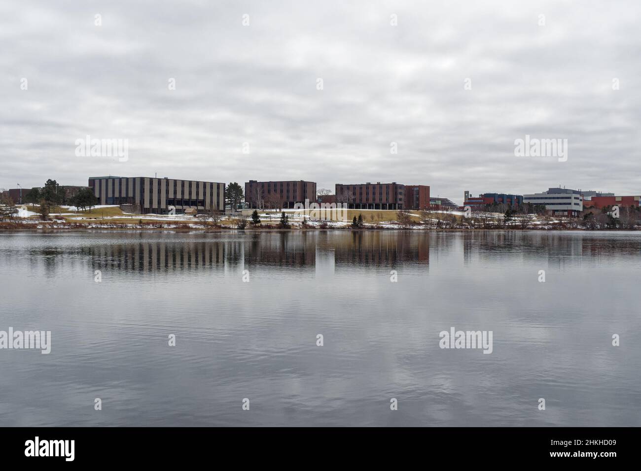 Building reflections in a lake Stock Photo - Alamy