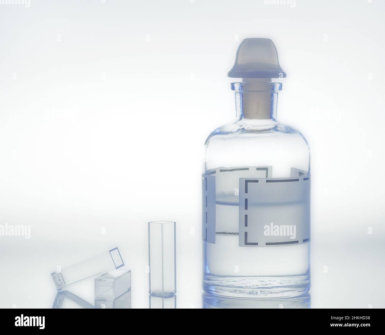 Cuvettes and reagent bottle Stock Photo - Alamy