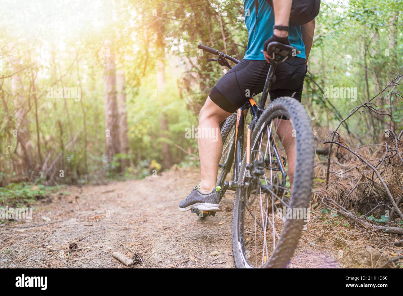 extreme cyclist ready to run back view Stock Photo - Alamy