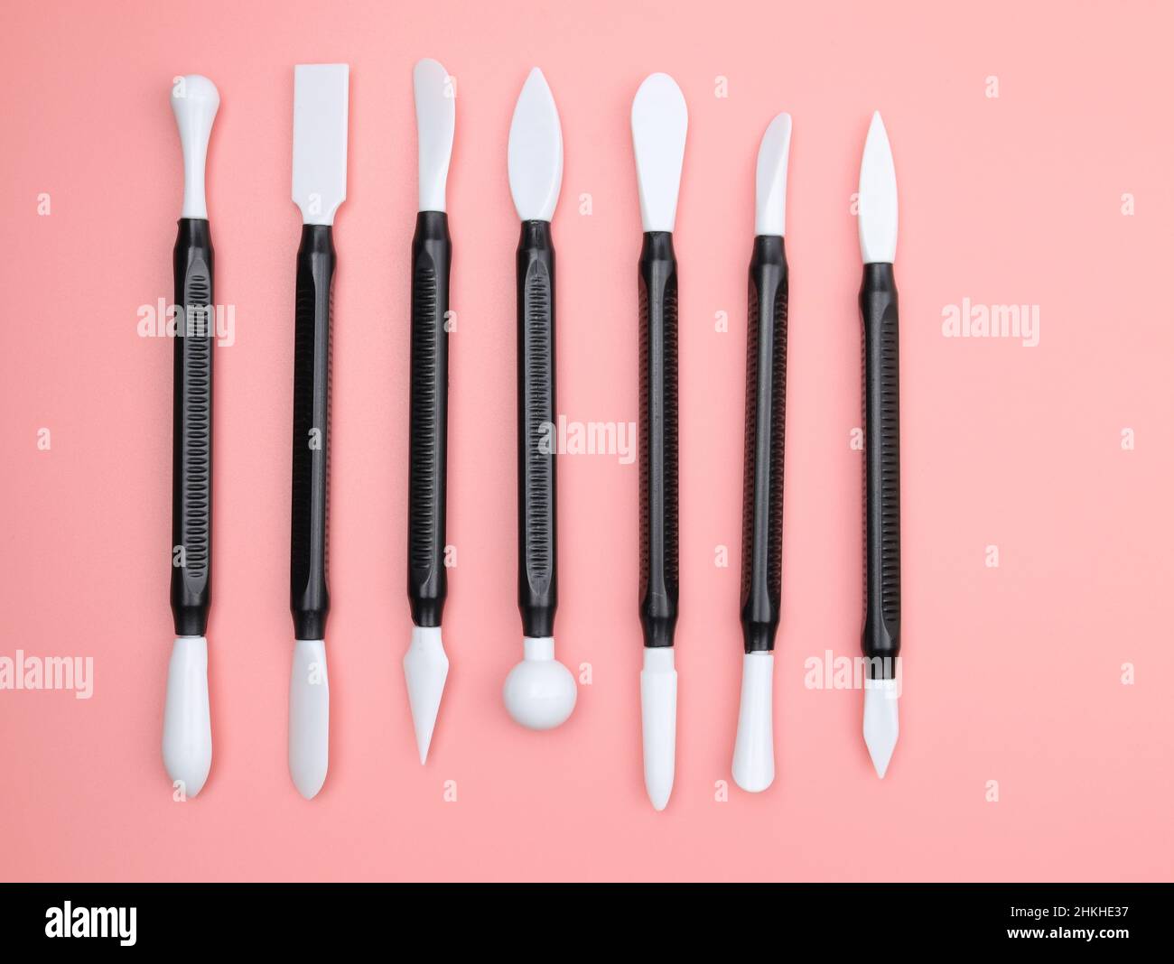 Plastic Tools for sculpting top view. Set of modern pottery tools on a ...
