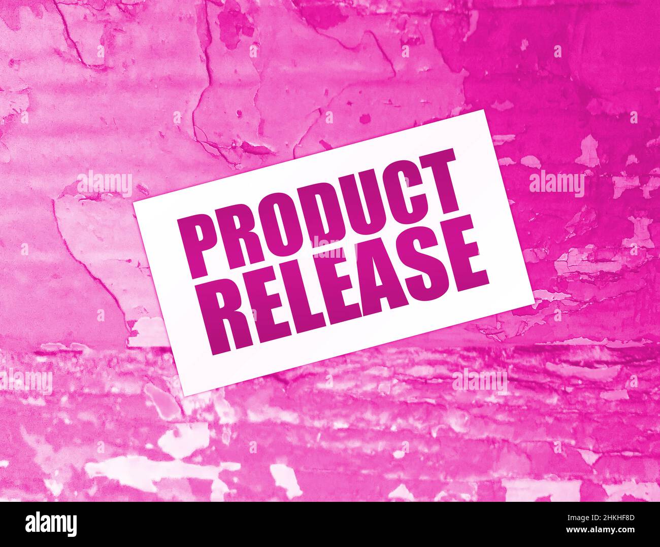 NEW RELEASE text on card on wooden background. business concept Stock ...