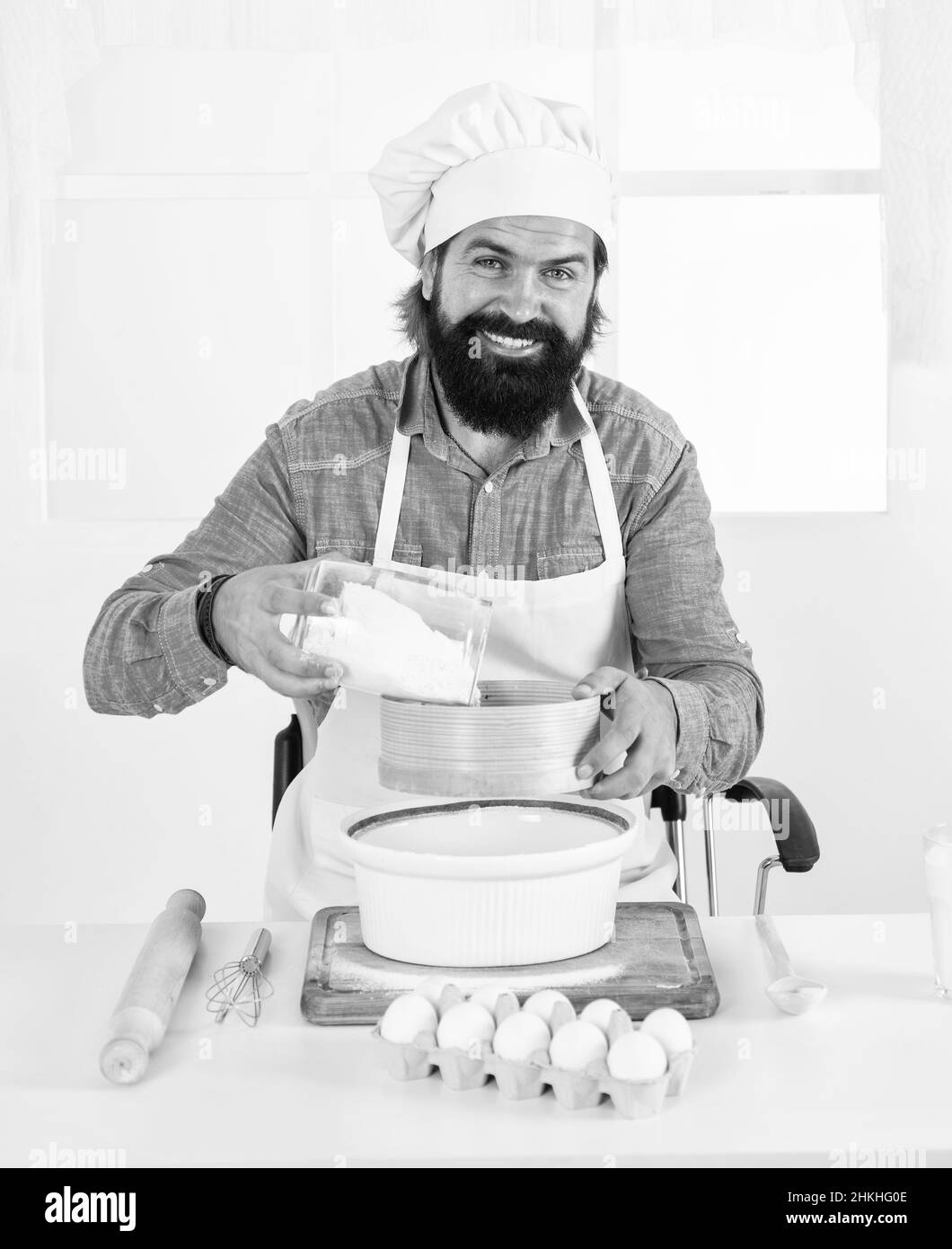 Keep your family safe. male chef in hat prepare healthy meal. handsome ...