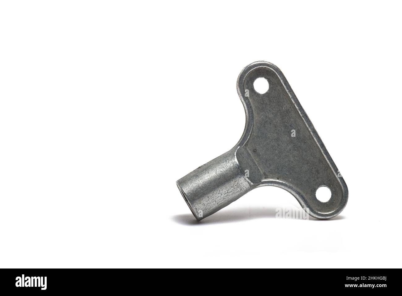 Close up side view of metal small square key for venting radiators and ...