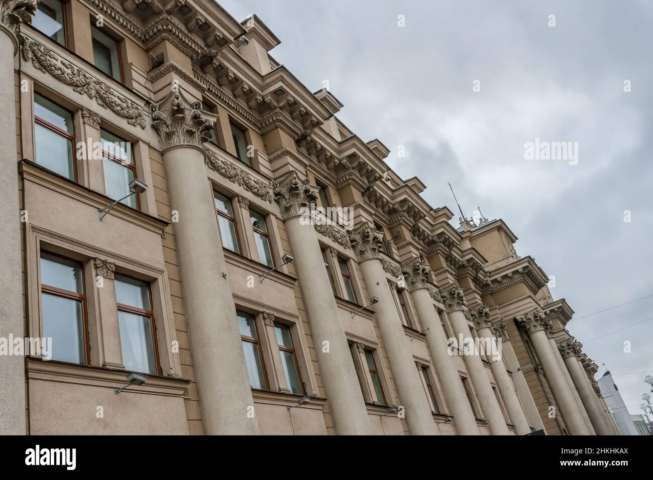 Old concrete pillar building with cloudy sky Stock Photo - Alamy