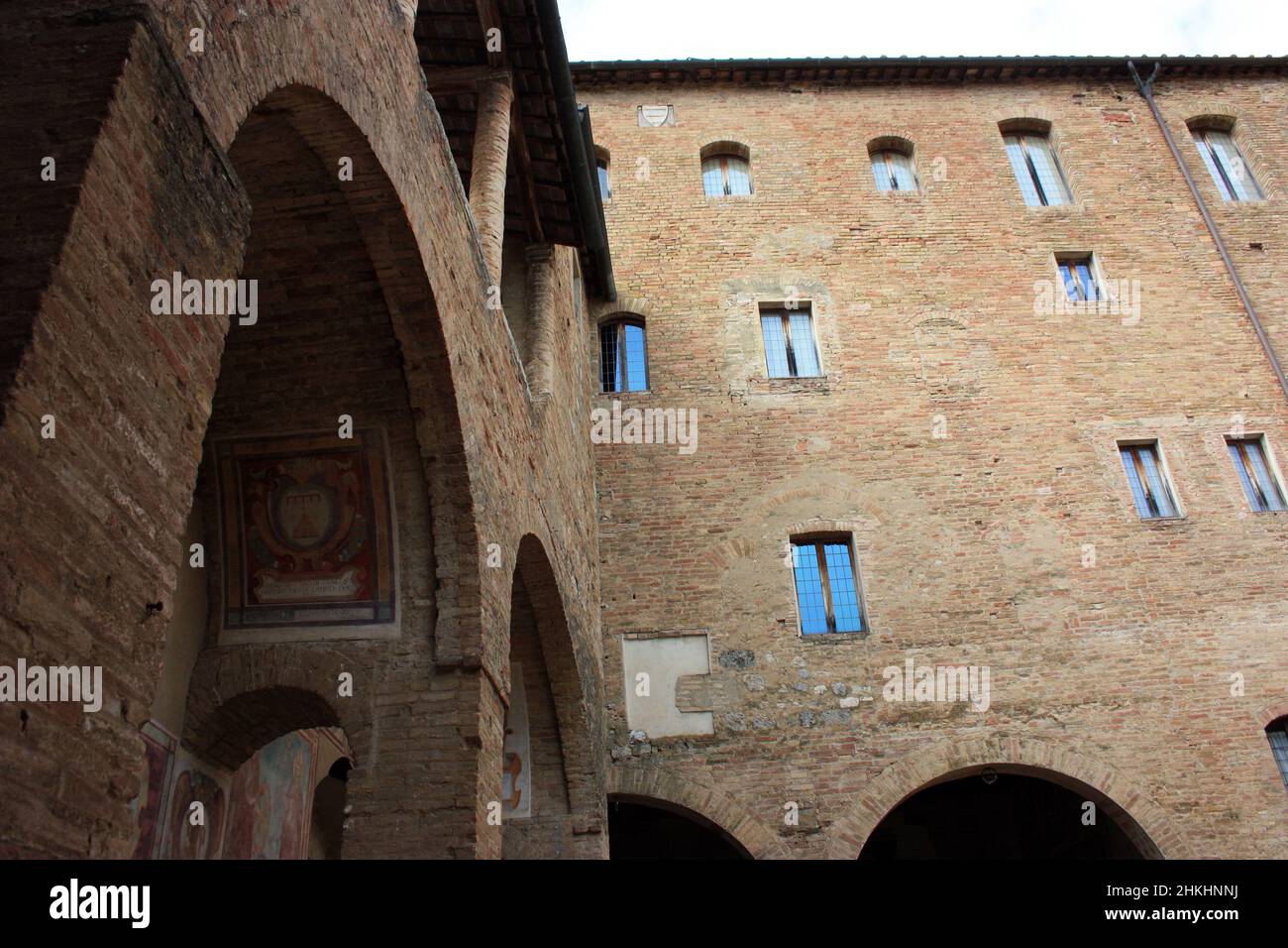 A journey through the ancient walls of Siena in the brick red of ...