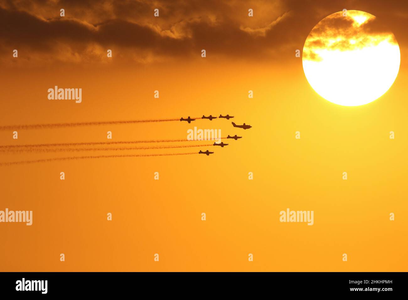 Aircraft flying past the sun - Beechcraft King Air B200 and Pilatus PC ...